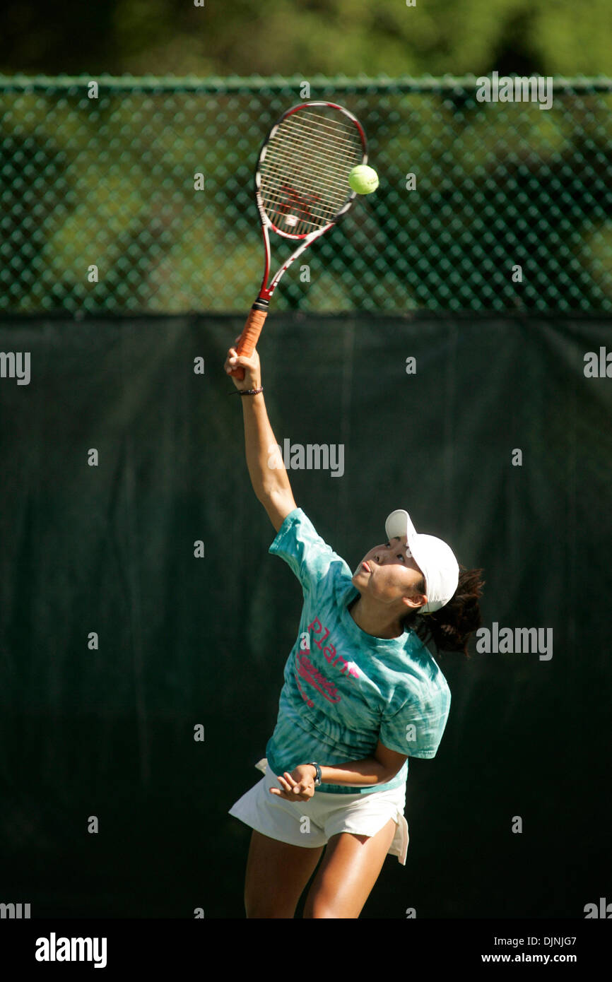 Plant High School's Amber Li serves the ball into play Wednesday, April ...