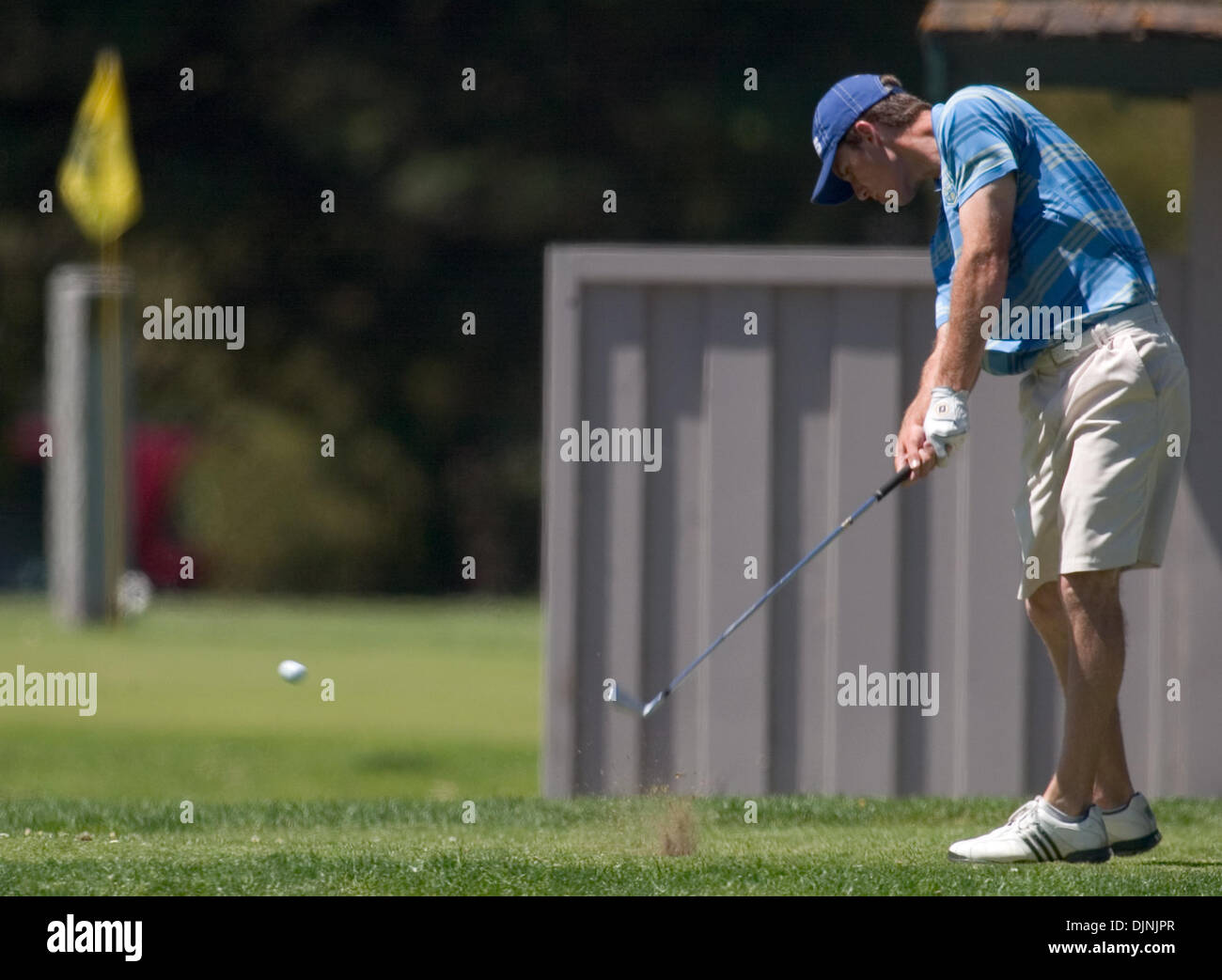 Michael Jensen uses an iron for his tee shot at the tenth hole in the ...