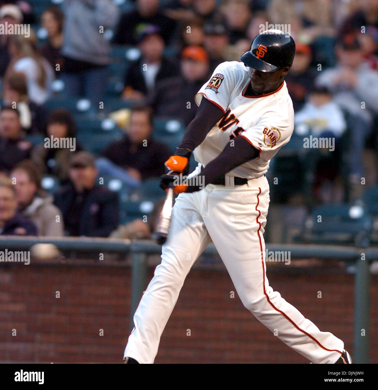 Fred Lewis (#14) of tjhe San Francisco Giants hits a single in the ...