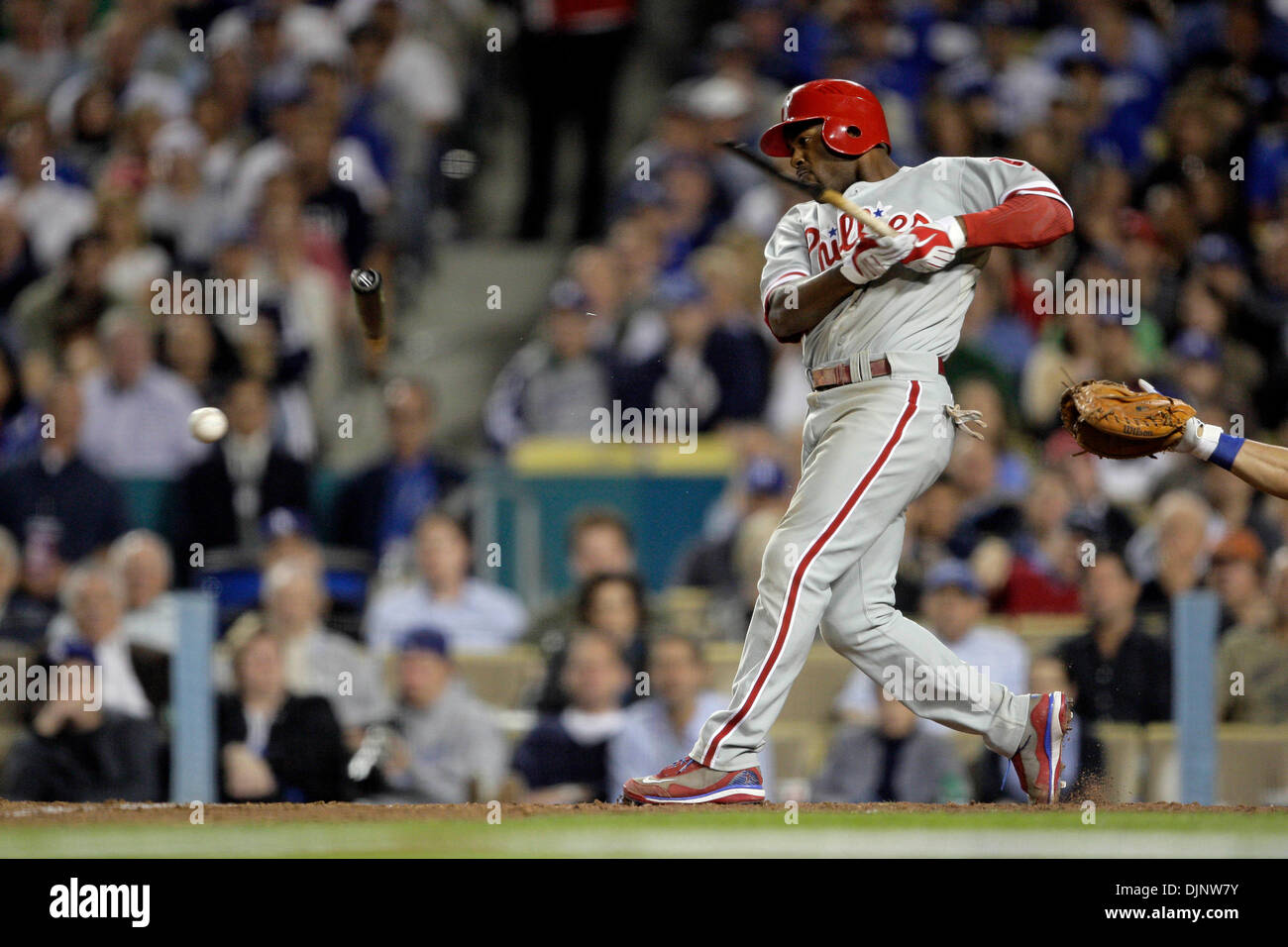 Philadelphia Phillies' Jimmy Rollins breaks the bat against the Dodgers ...