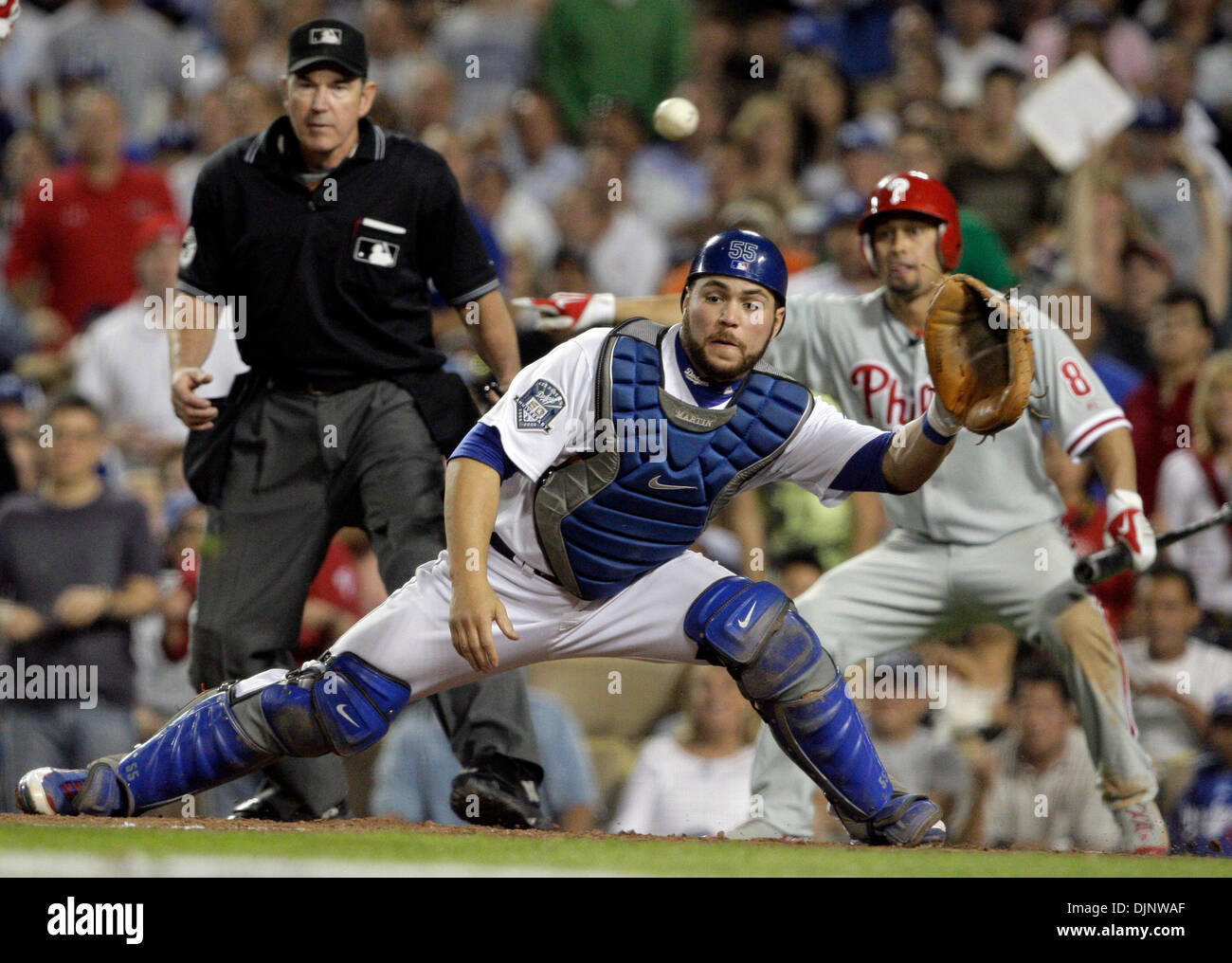 Shane Victorino motions Chase Utley to slide past Dodger catcher ...