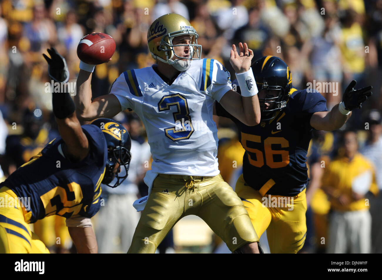 UCLA Bruins quarterback Kevin Craft, #3, throws under pressure against ...