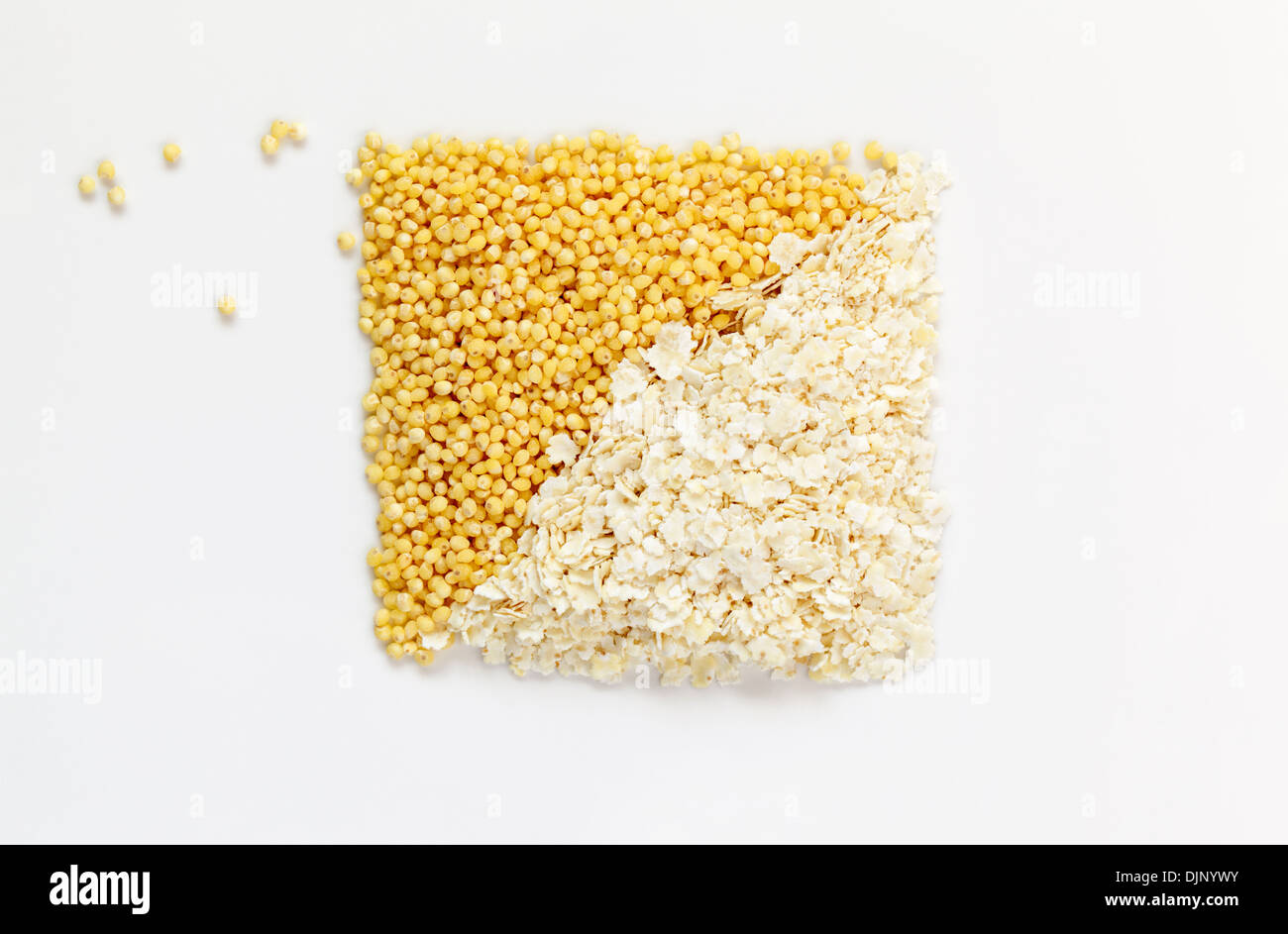 Uncooked millet grains and millet flakes Stock Photo - Alamy