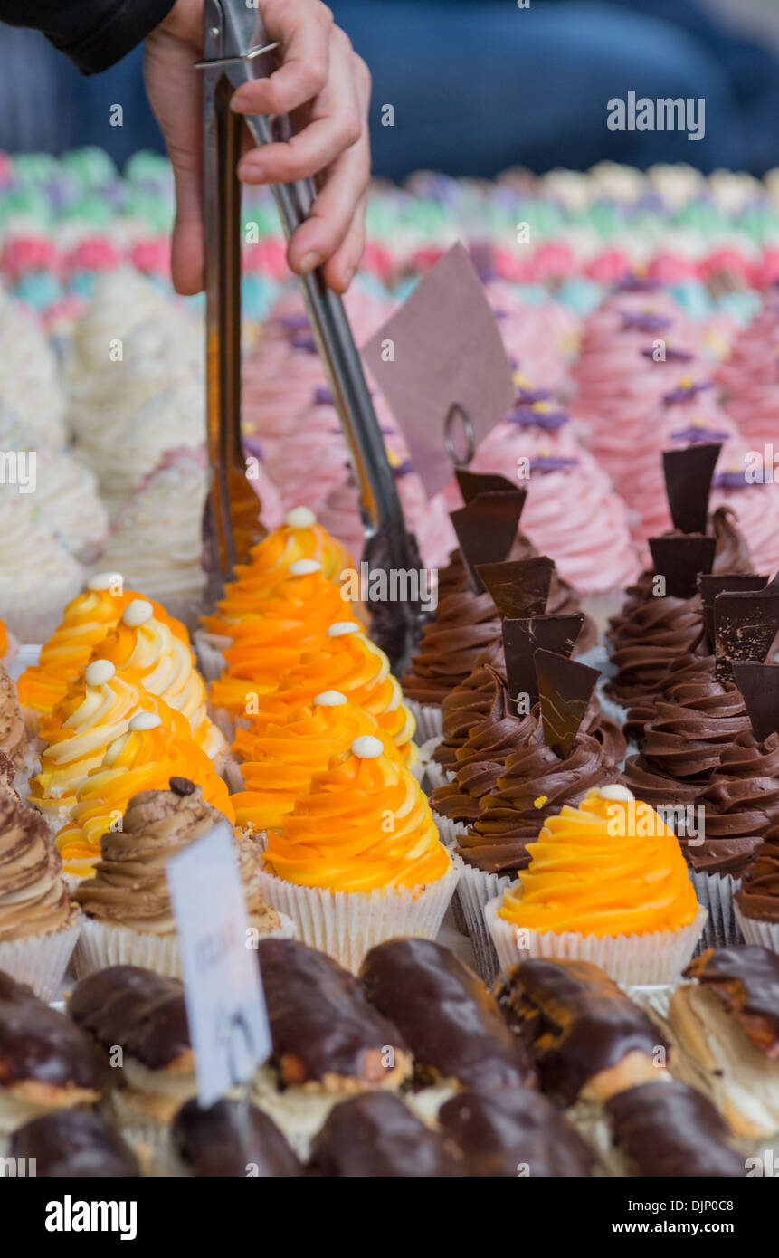 Buying cakes from the pâtisserie stall at Borough Market Stock Photo ...