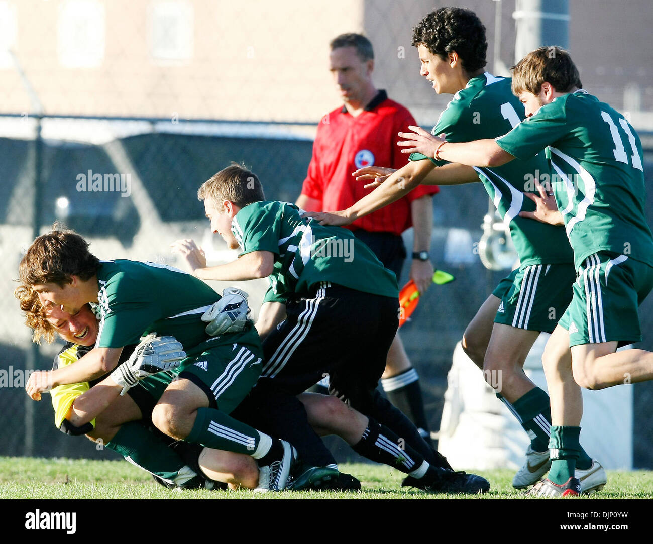 FOR SPORTS - Members of the Reagan Rattlers soccer team celebrate with ...