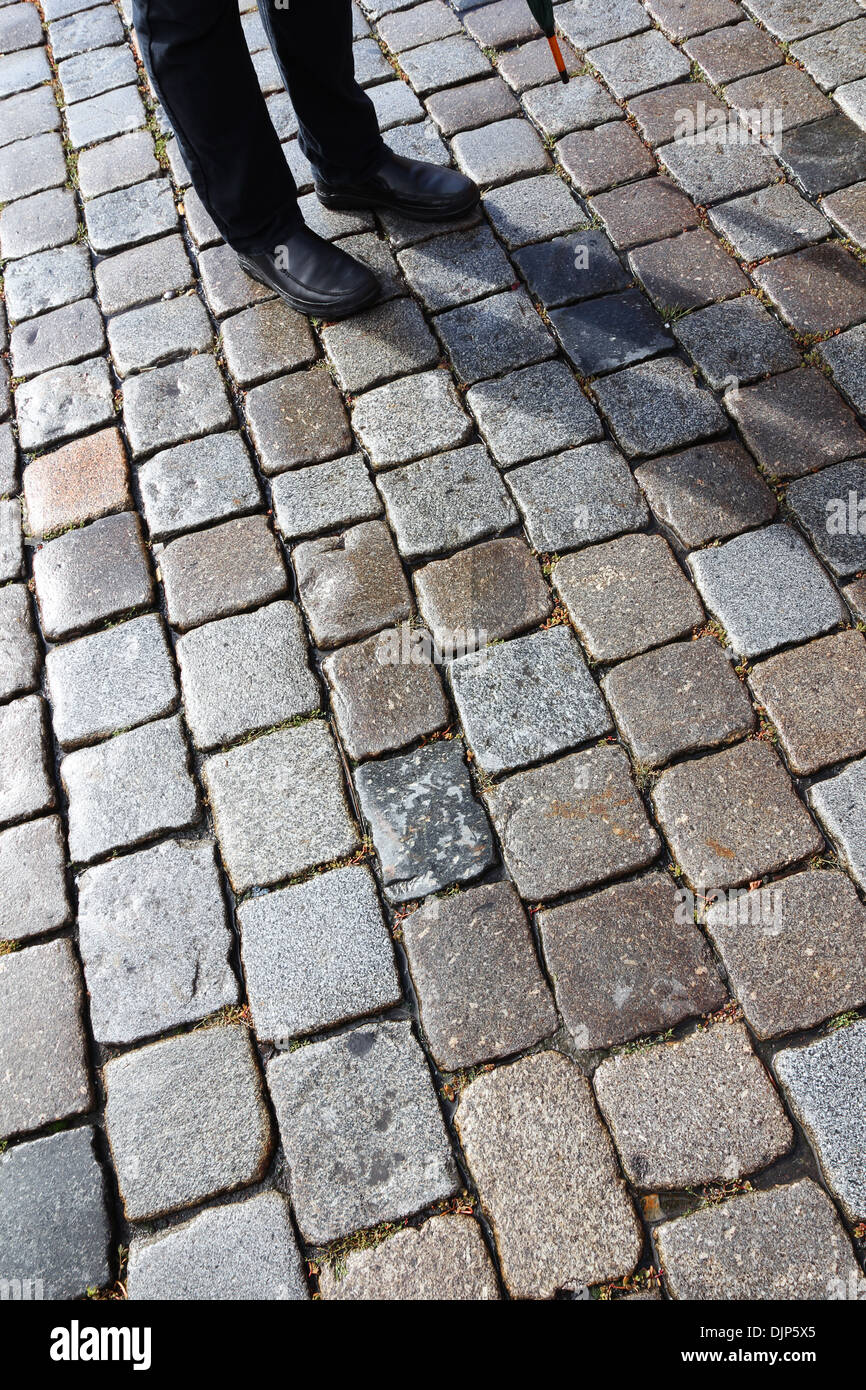 Cobblestones feet legs hi-res stock photography and images - Alamy