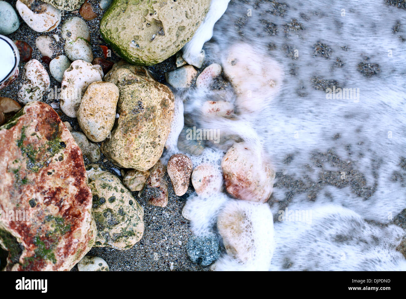 River washed stones hi-res stock photography and images - Alamy