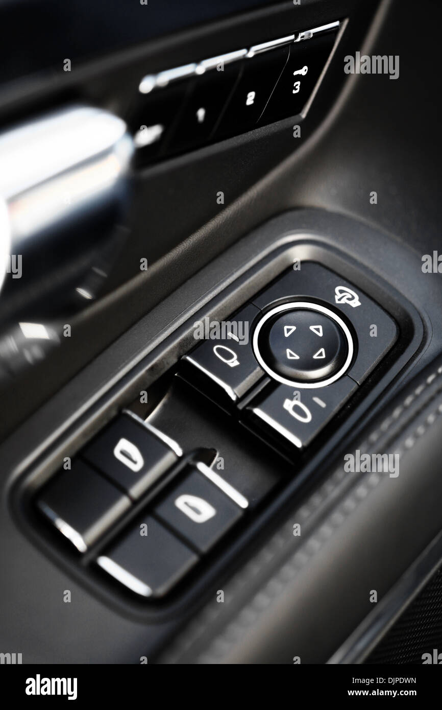 Detail on buttons controlling the windows in a car Stock Photo - Alamy