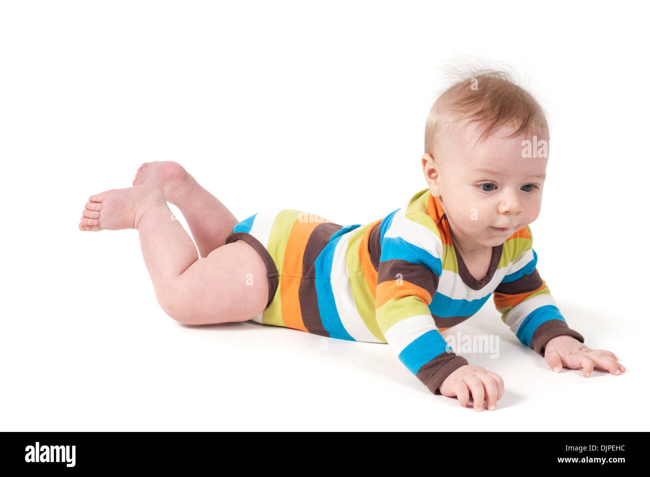 Cute kid in a striped body lying on his tummy Stock Photo - Alamy