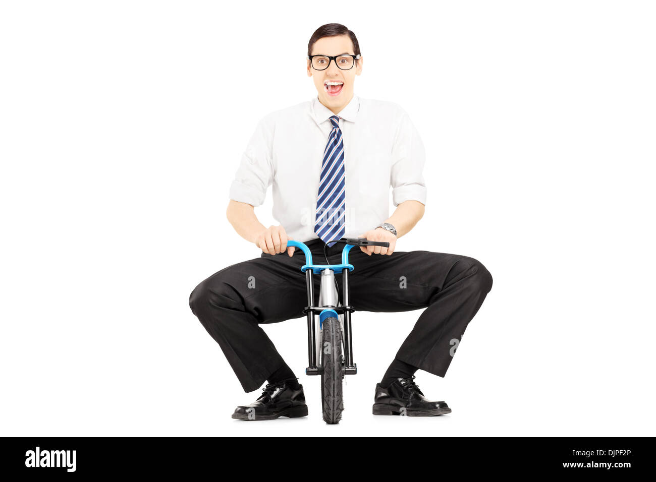 Happy businessman riding bicycle hi-res stock photography and images ...