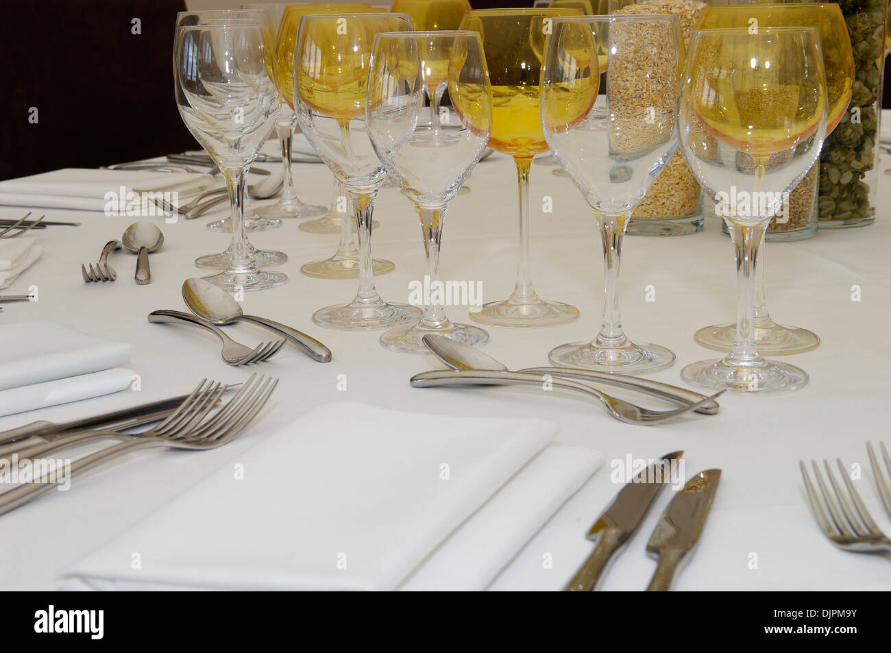 Table laid out ready for service at event Stock Photo - Alamy