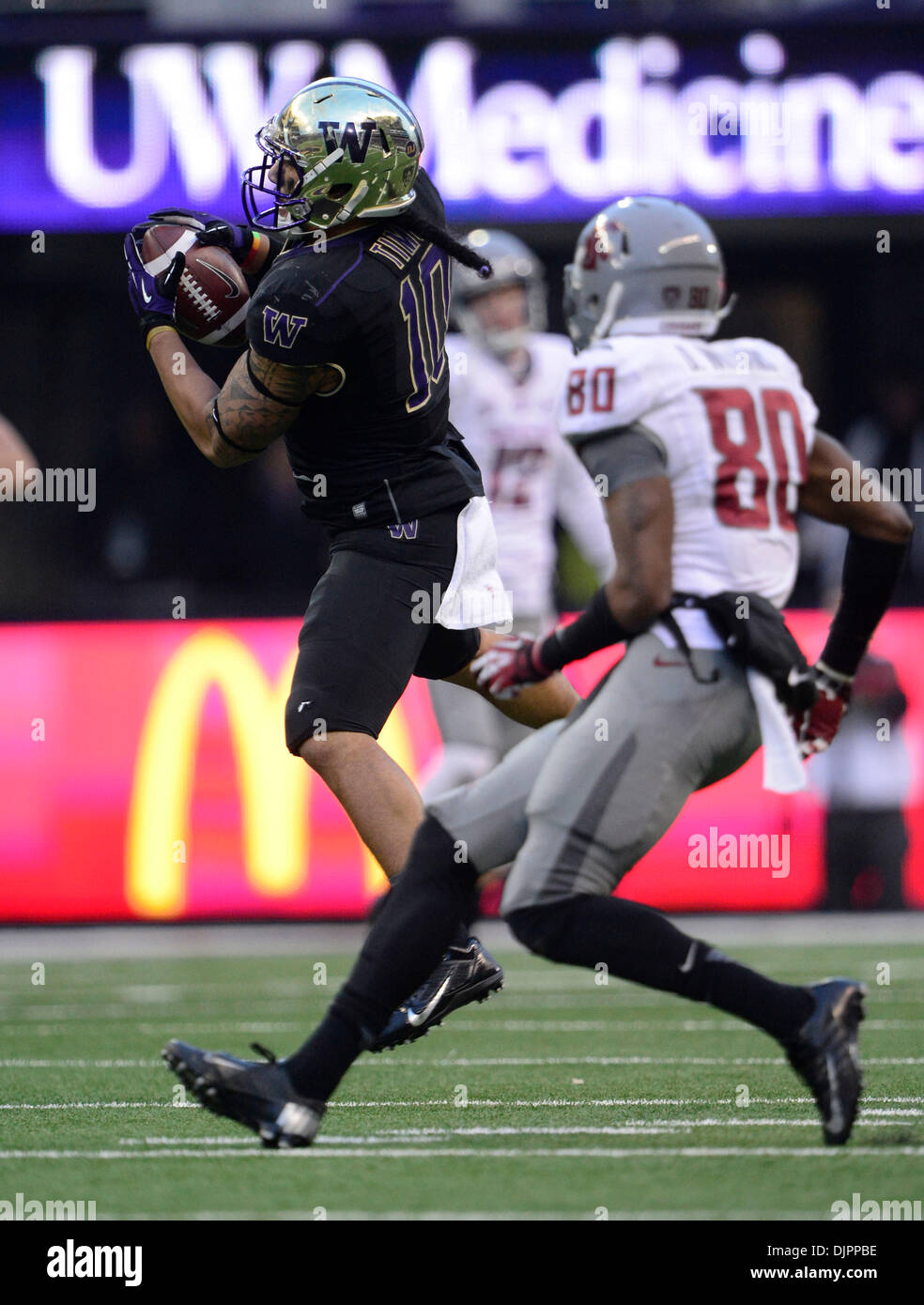 November 29, 2013.Washington Huskies linebacker John Timu #10 ...