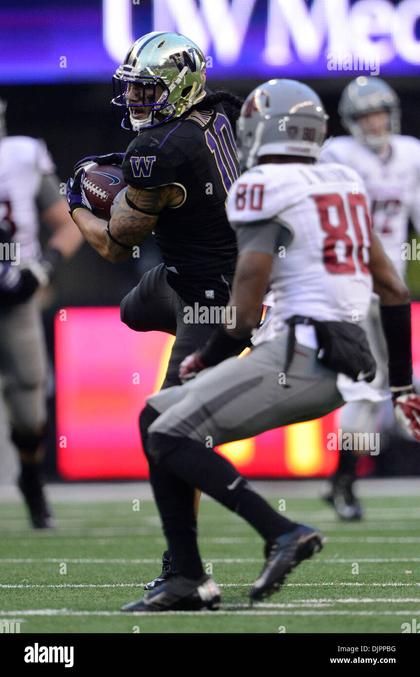 November 29, 2013.Washington Huskies linebacker John Timu #10 ...