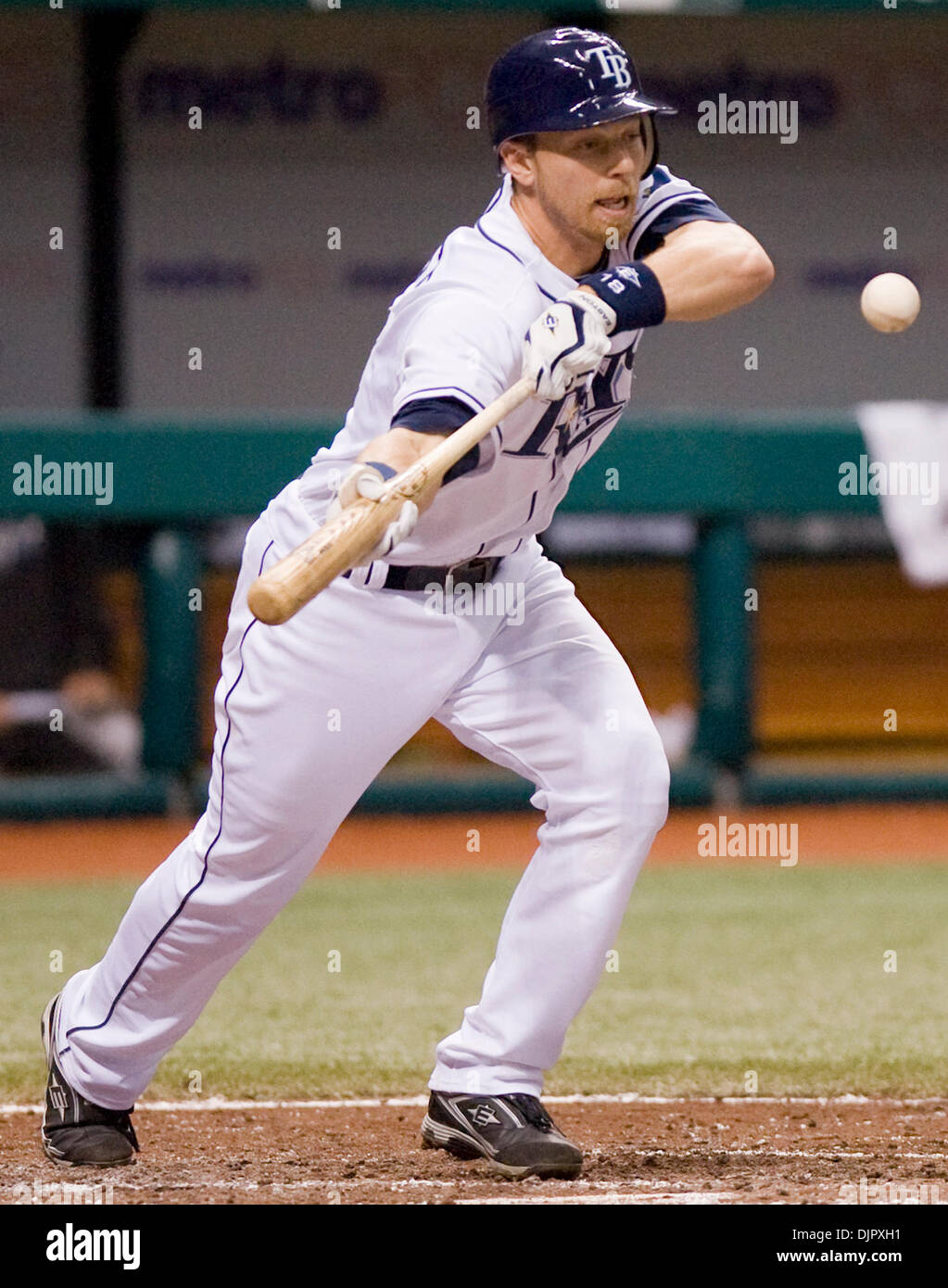 Apr. 24, 2010 - St. Petersburg, Florida, U.S. - Ben Zobrist lays down a ...