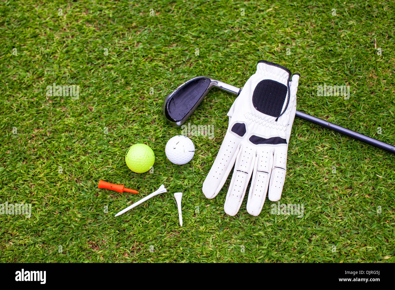 Golf equipment on green grass Stock Photo - Alamy