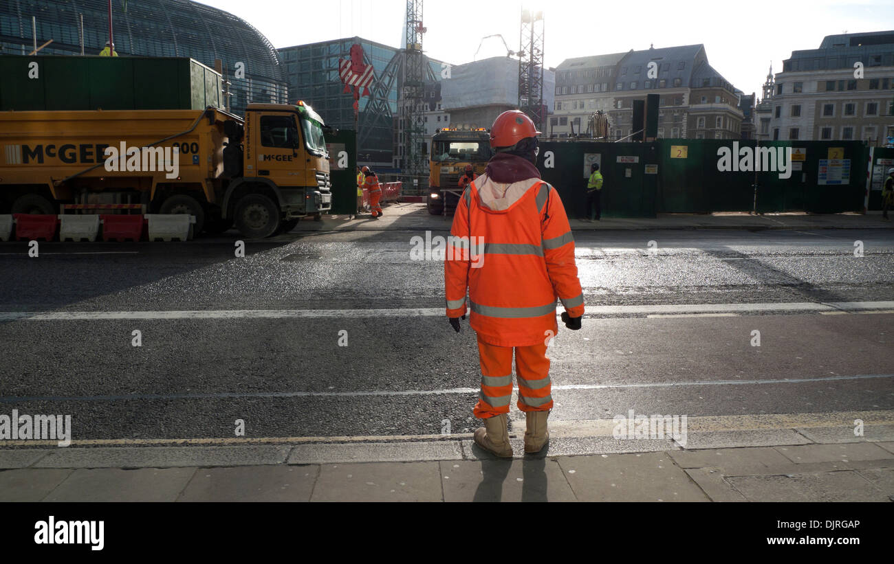 Worker at entrance to Bloomberg Place construction site on Queen ...