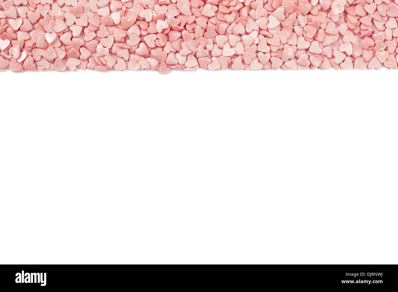 Sugar sprinkles on top of icing birthday cake. Colored glaze decoration ...