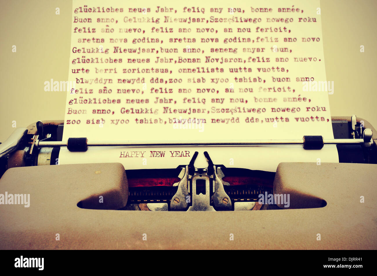 happy new year written in different languages with an old typewriter ...