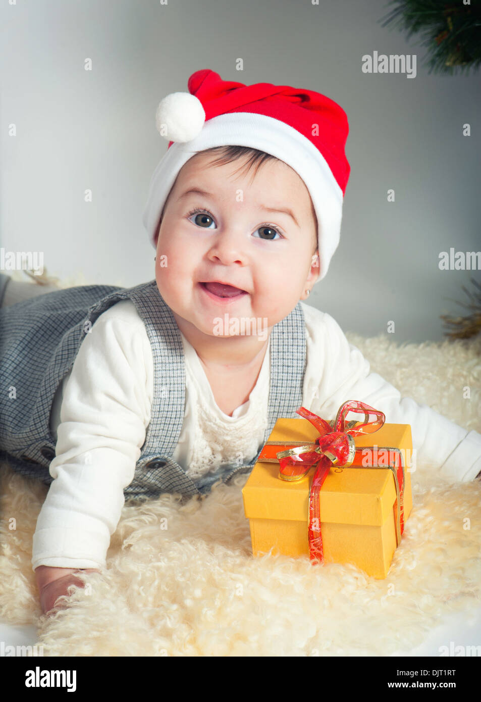 Baby has red cap hi-res stock photography and images - Alamy