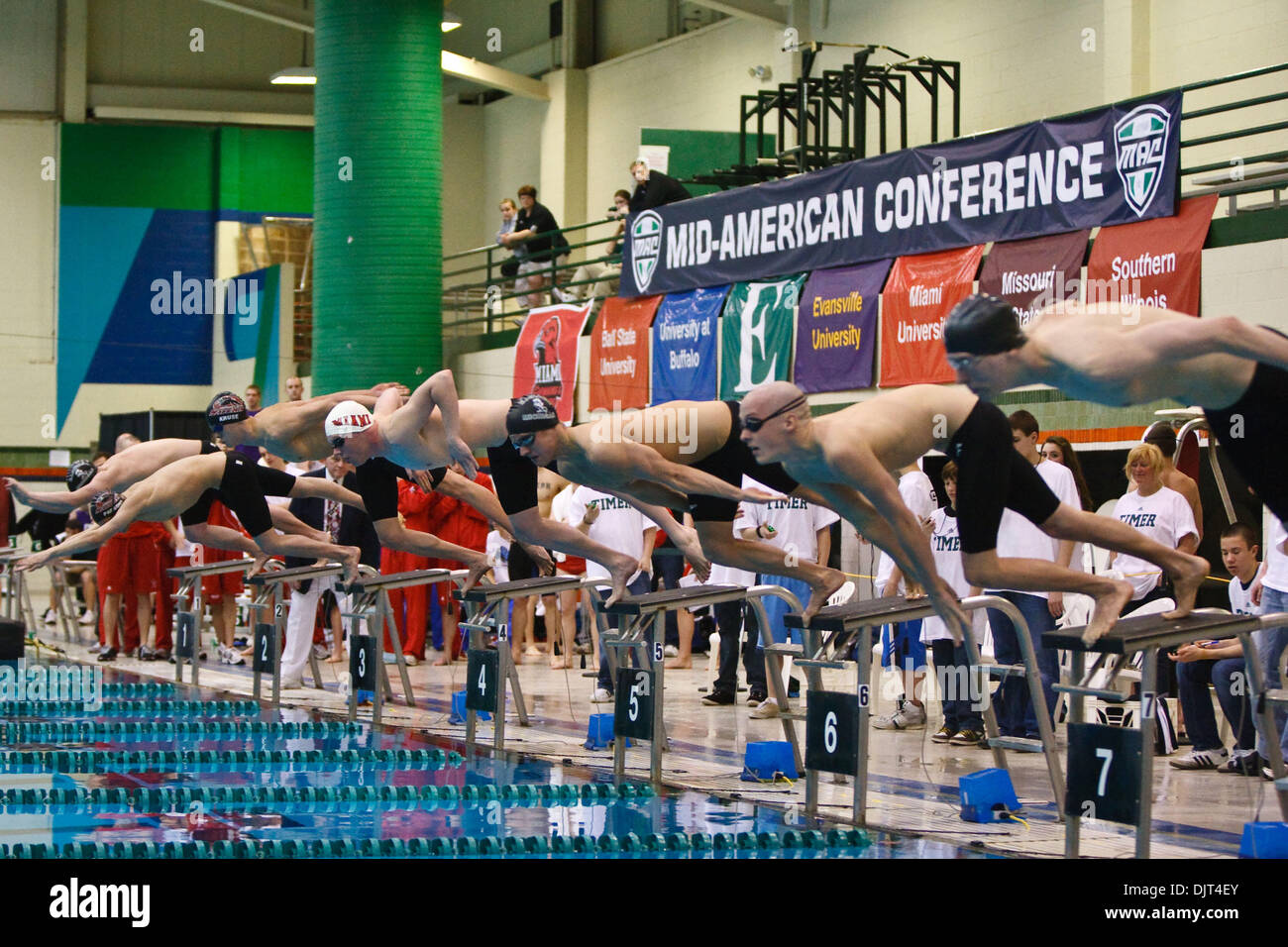 Swimmers wait for the start of 500 Yard Freestyle event during meet ...