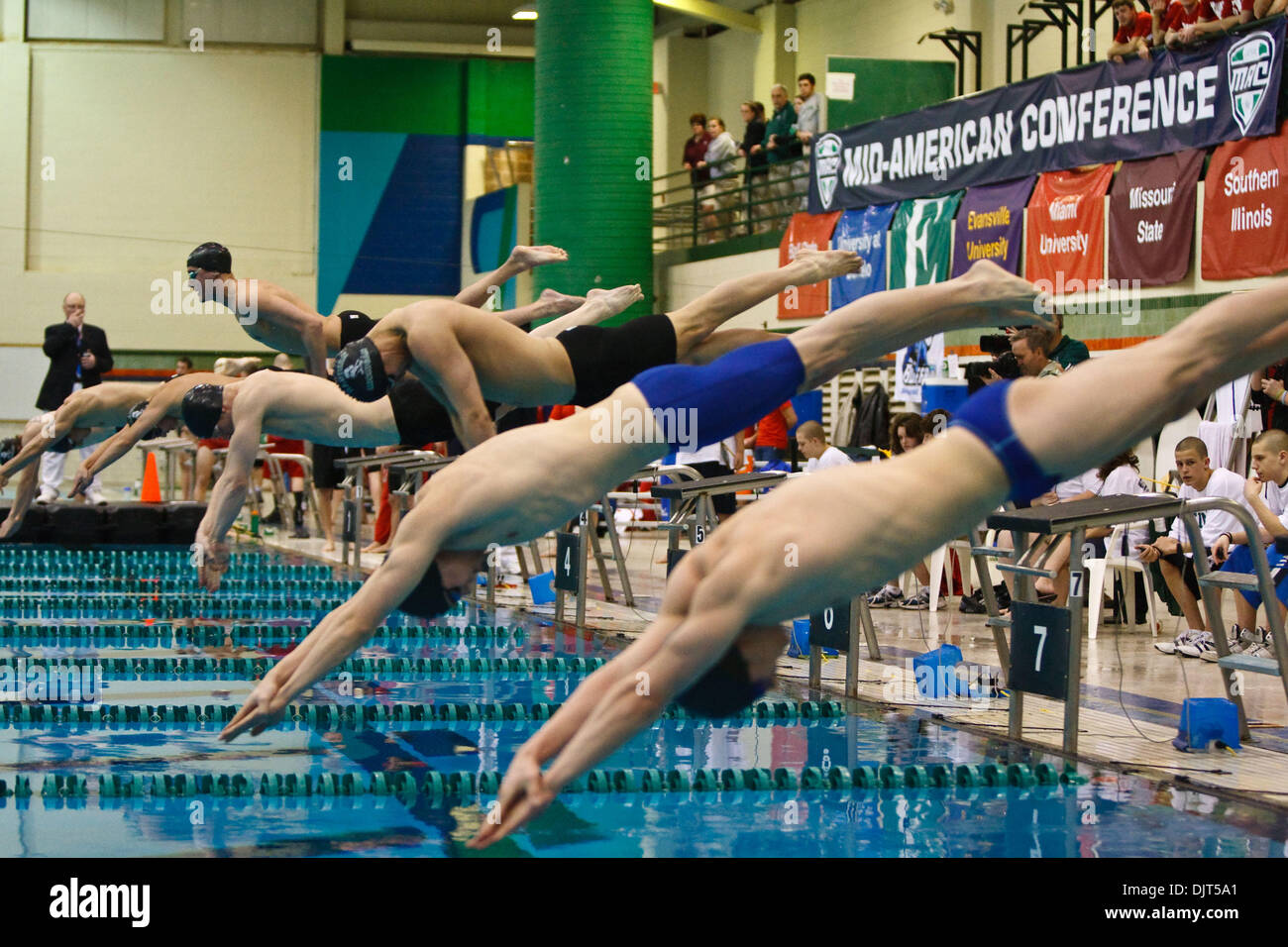 Competitors dive into the water at the start of the 200 Yard ...
