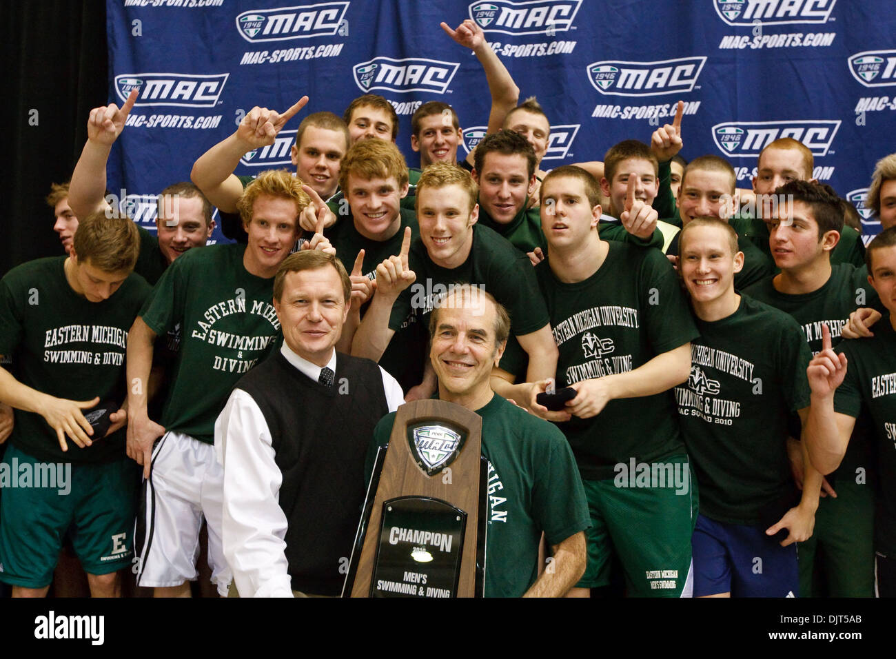 MAC Commissioner Jon Steinbrecher presents the championship trophy to ...