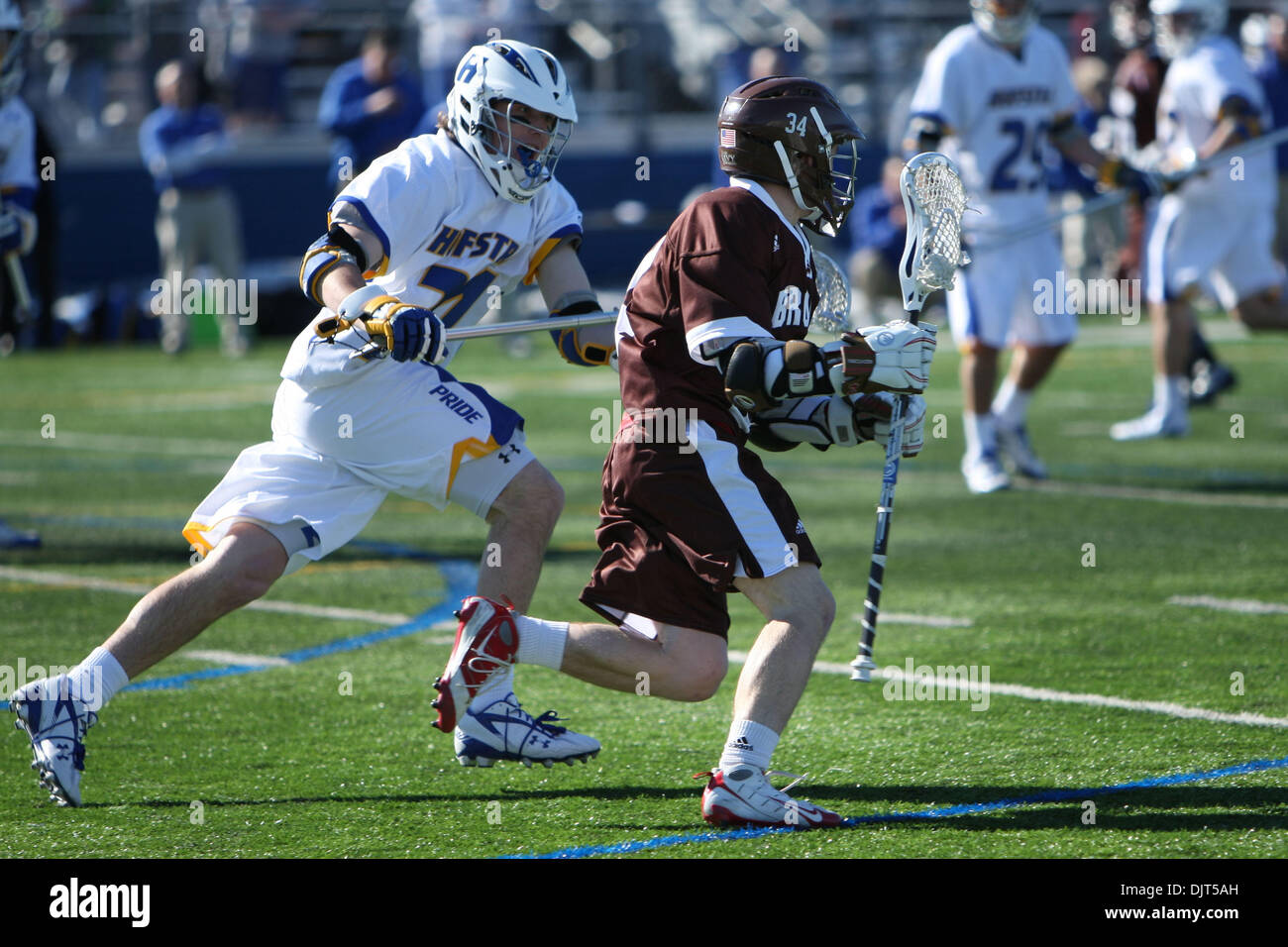 Hofstra Defender Adrian Sorichetti (#77) prepares to check Brown Attack ...