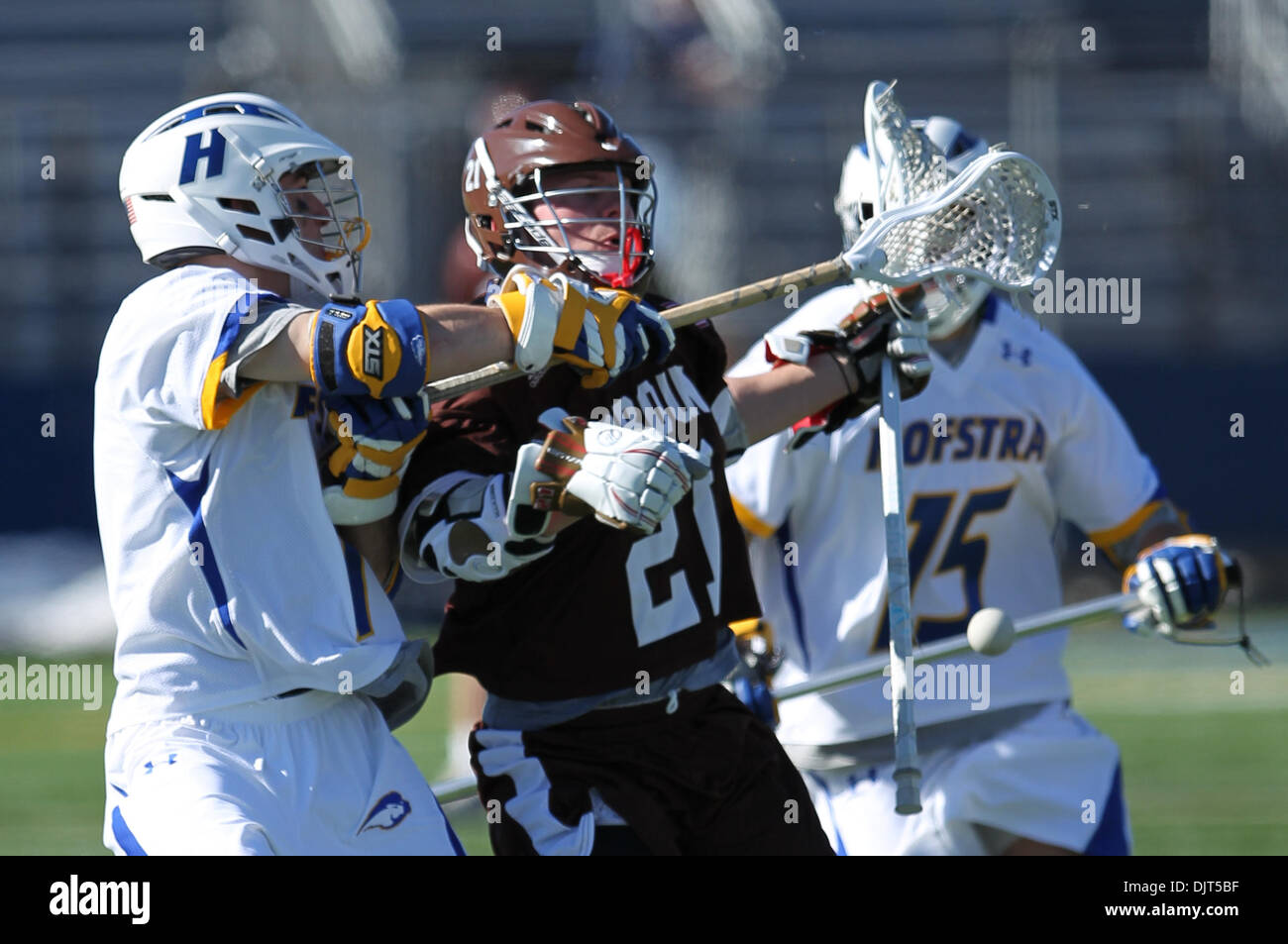 Brown Midfielder Charlie Kenney (#21) looses the ball to a stick check ...