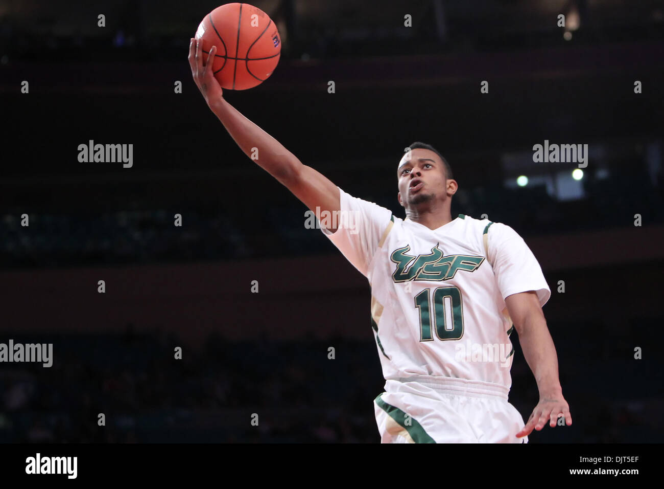 South Florida guard Anthony Crater #10 dup for the point.USF defeated ...