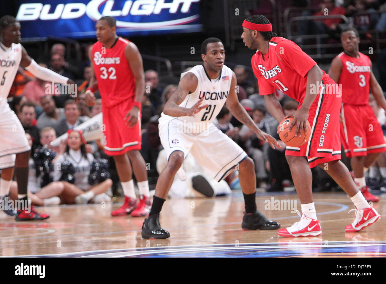 Connecticut forward Stanley Robinson #21 and St. John's guard/forward ...