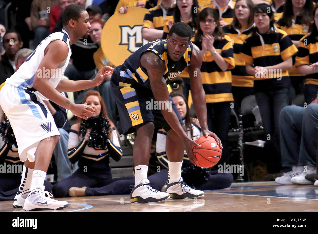 Marquette center Youssoupha Mbao #55 with ball. Marquette defeated ...