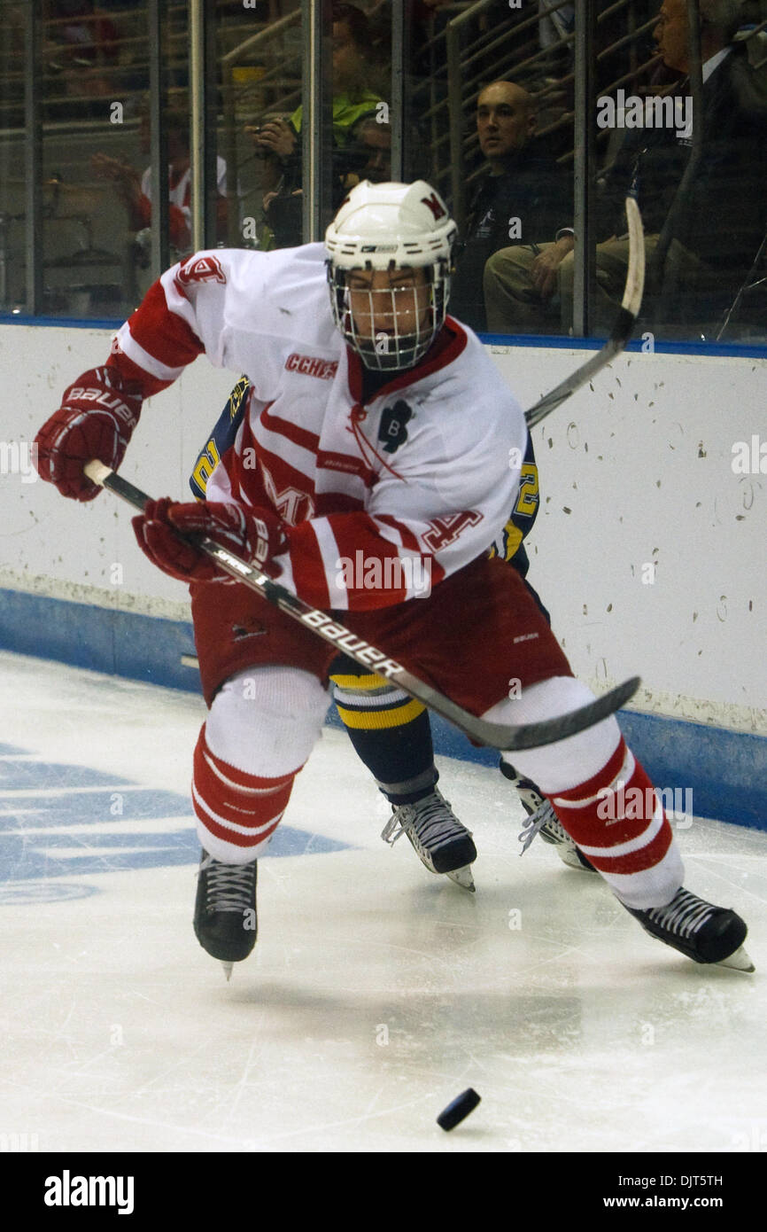 Miami defenseman Will Weber (4) skates after the puck during game ...