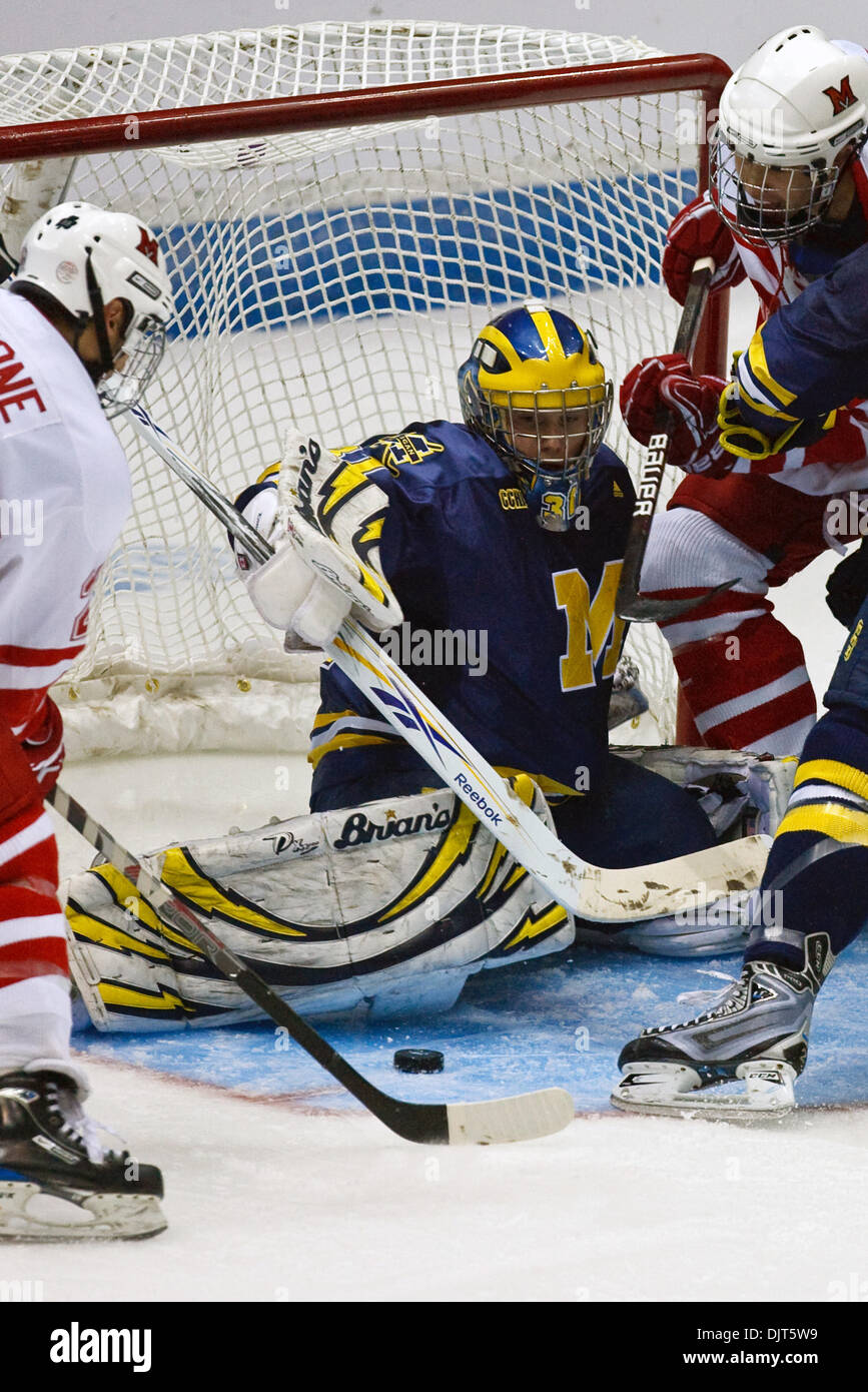 Michigan goalie Shawn Hunwick (31) blocks a shot on goal during game ...