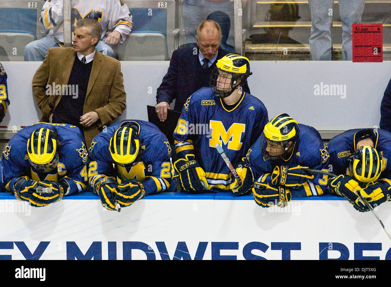 Michigan's Chris Summers (4), Jeff Rohrkemper (22), Ben Winnett (16 ...
