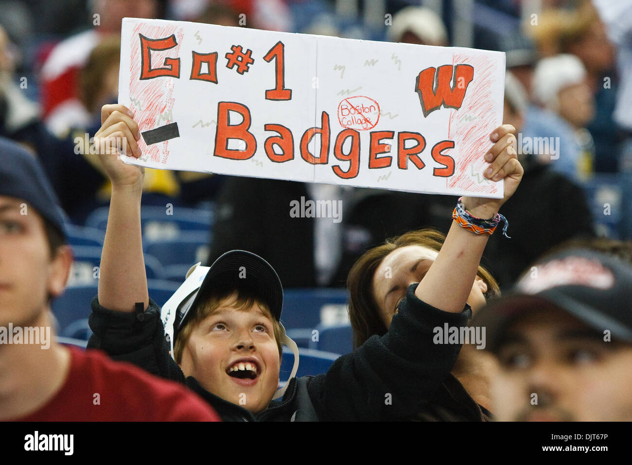 A young Wisconsin Badger fan shows his support during game action ...