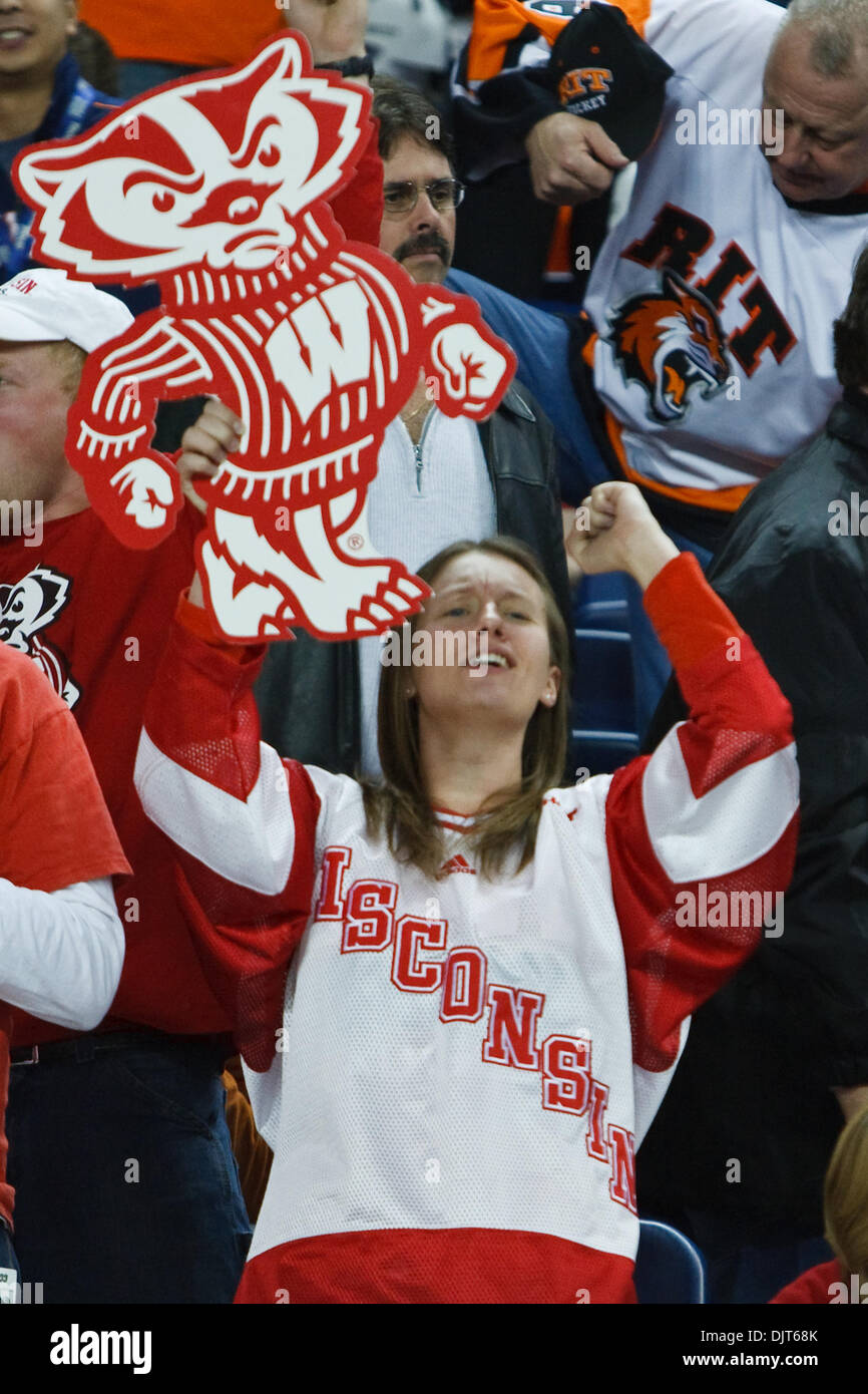A Wisconsin Badger fan shows her support during game action. Boston ...