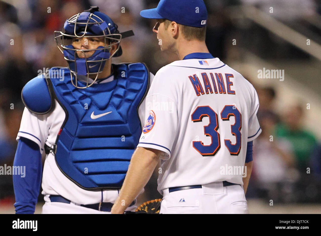 Mets Pitcher John Maine (#33) and Catcher Rod Barajas (#21) talk on the ...