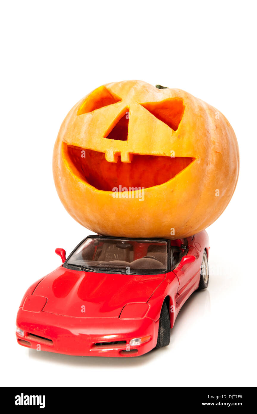 halloween pumpkin with a sports car Stock Photo - Alamy