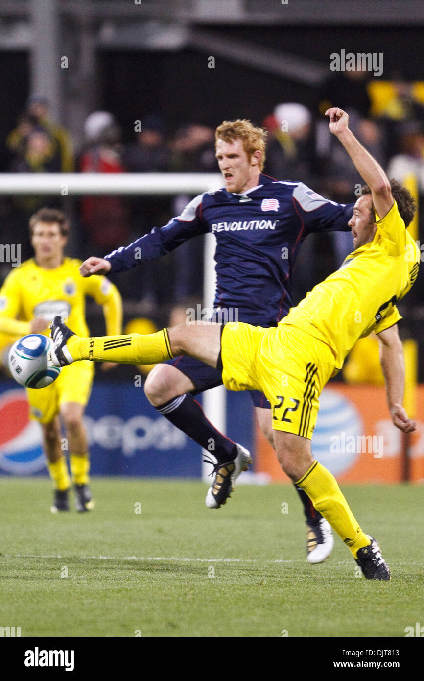 Crew midfielder Adam Moffat #22 kicks the ball away from Revolution ...