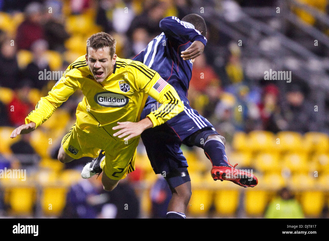 Crew defender Eric Brunner #23 finds himself parallel to the ground ...
