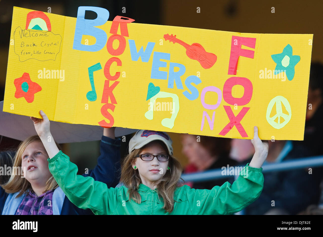 A young fan shows her support for American Idol contestant Crystal ...
