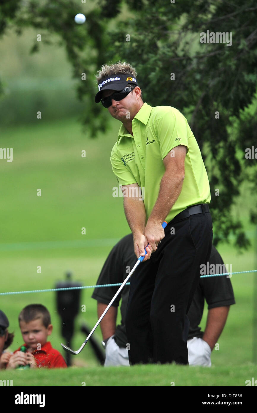 Brian Gay is putting at the 7th green during the HP Byron Nelson ...