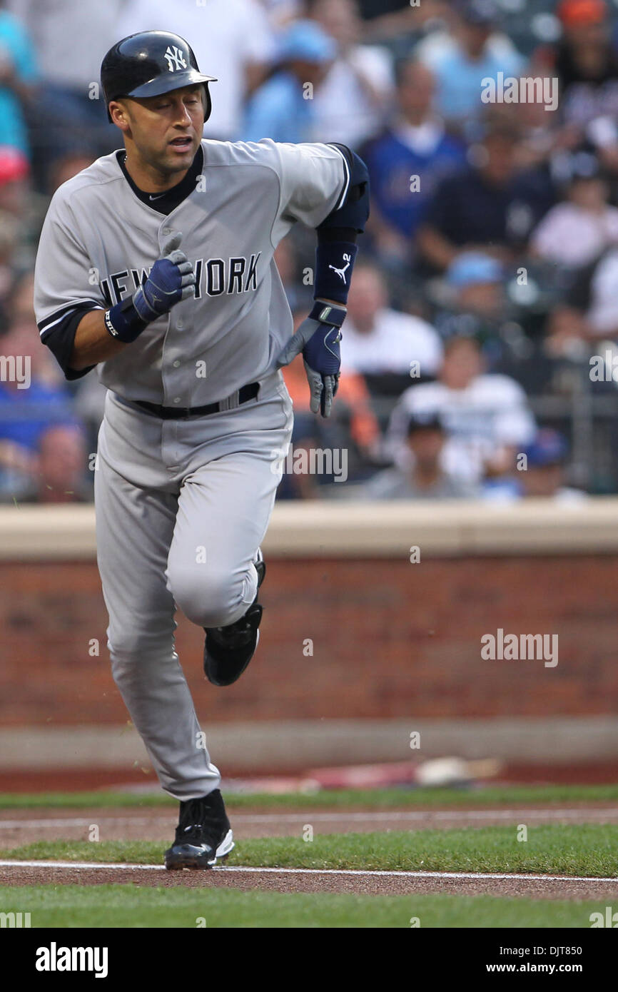 New York Yankees Infielder Derek Jeter (#2) heads to first. The Yankees ...