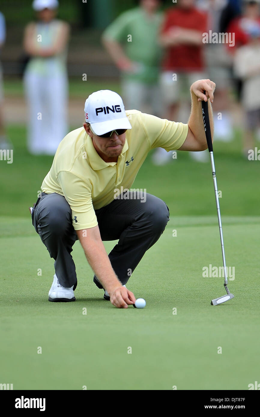 Hunter Mahan lines up the ball during the HP Byron Nelson Championship ...