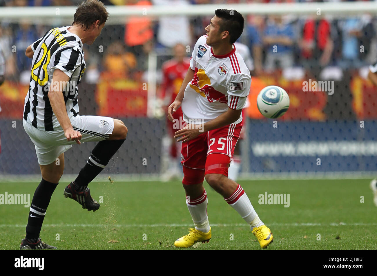 Juventus Defender Alessandro Bemardini (#23) sends the ball past Red ...