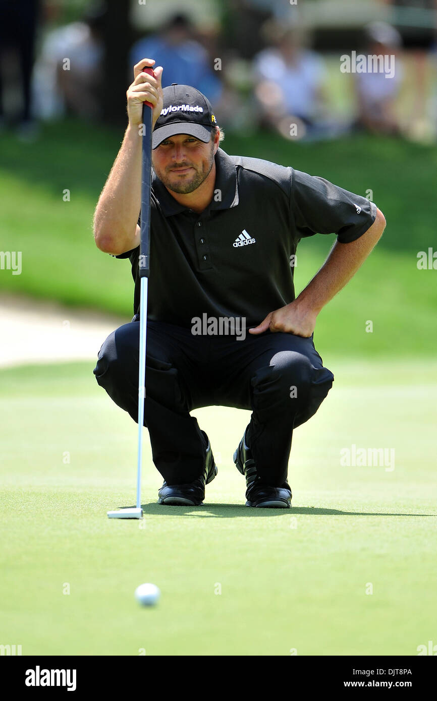 Blake Adams putts at the 8th hole during the HP Byron Nelson ...