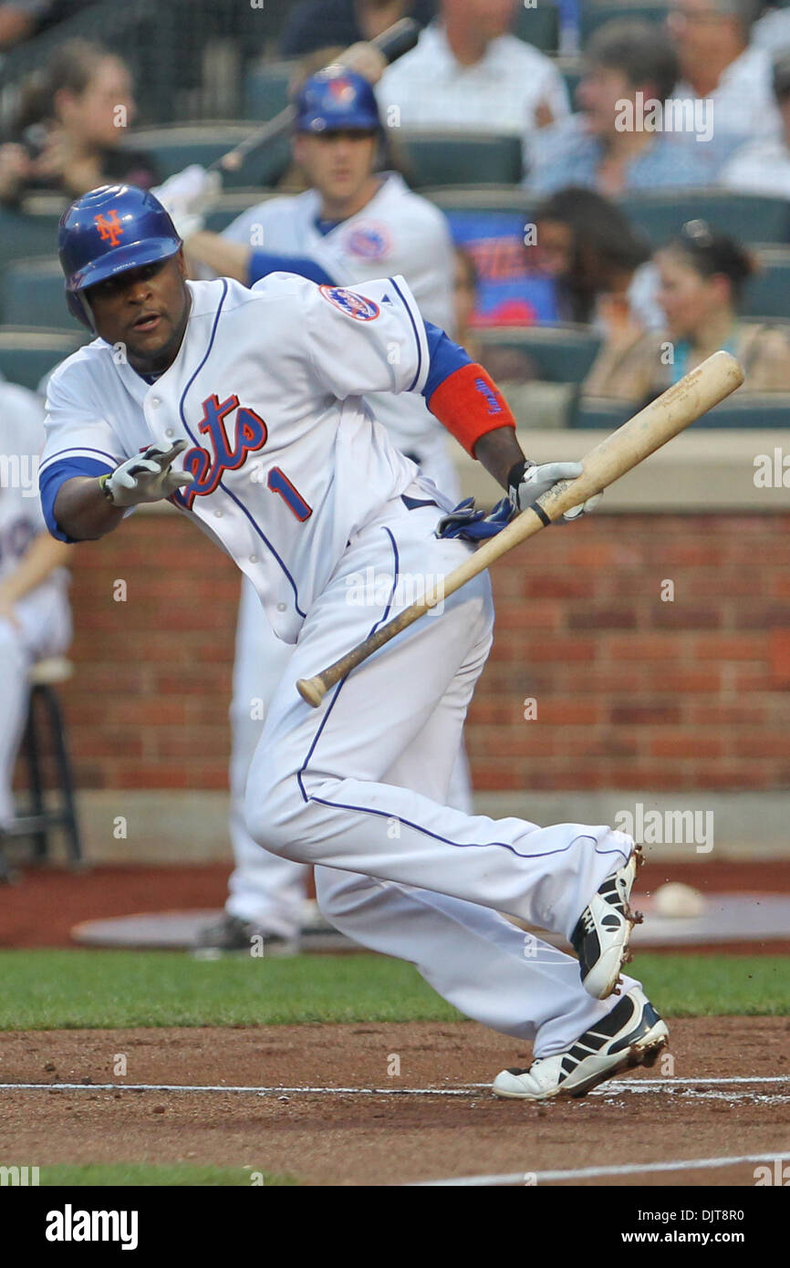Mets Infielder Luis Castillo (#1) with a hit and a run to first. The ...
