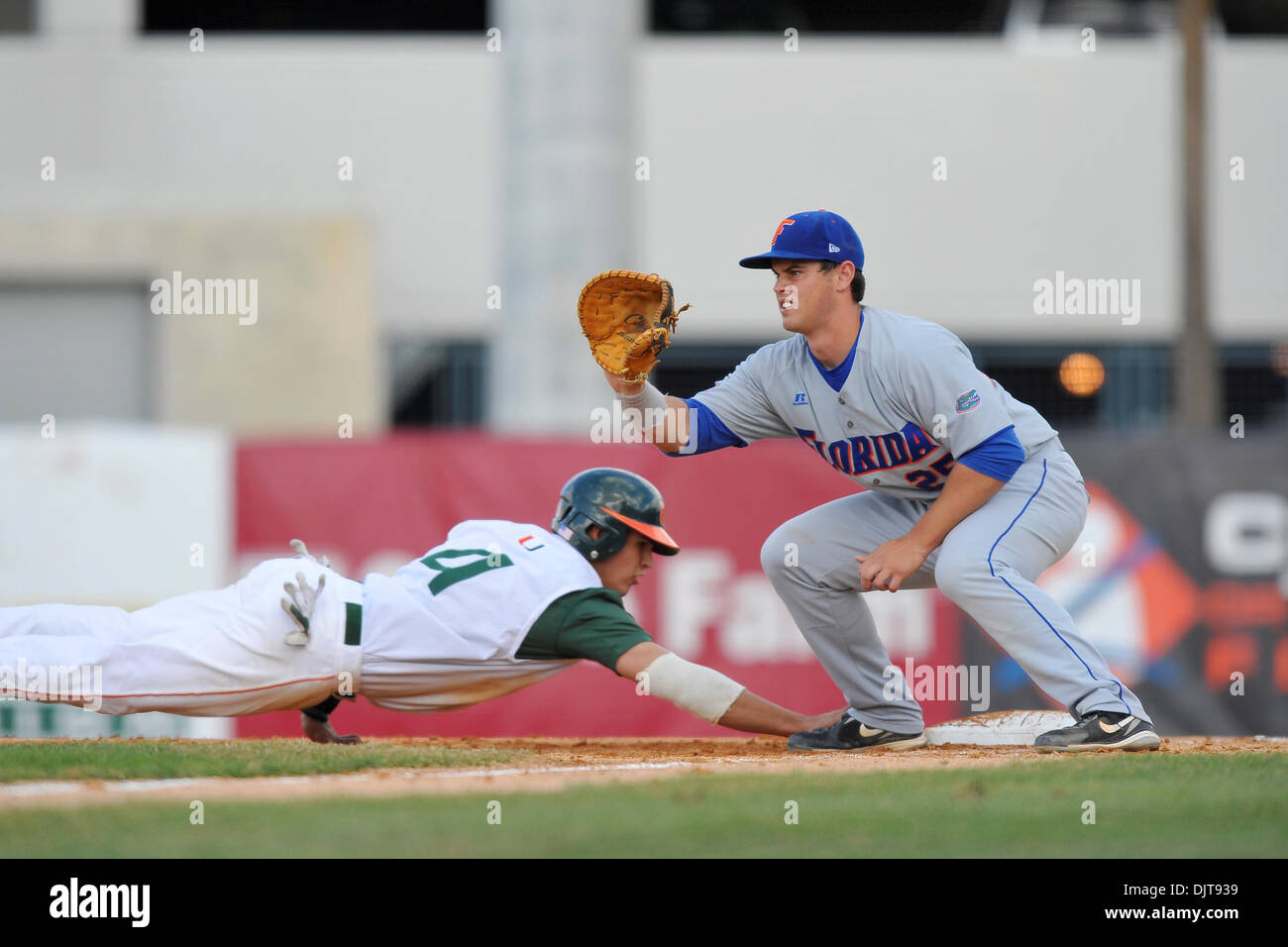 Florida Gators first baseman Preston Tucker awaits throw as University ...