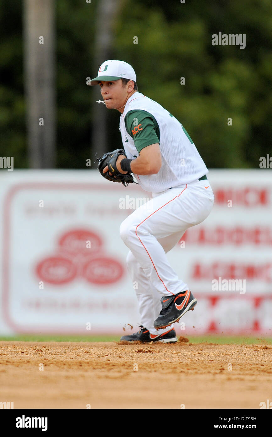 University of Miami's second baseman Scott Lawson prepares to throw out ...