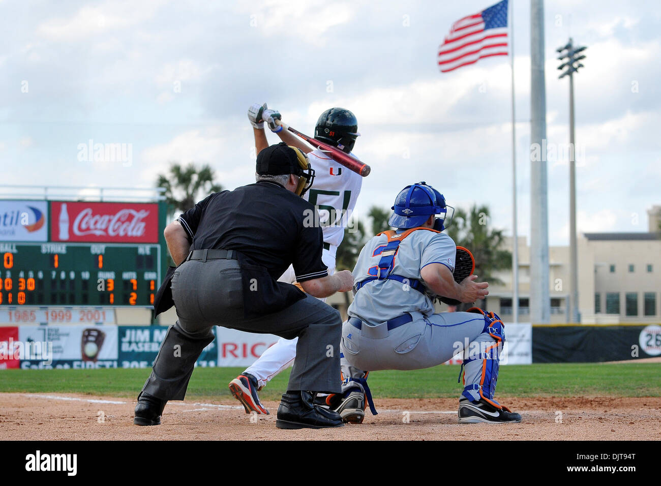 University of Miami's Ryan Perry watches a ball hit to right field. The ...